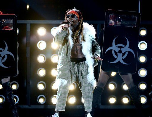 Rapper Lil Wayne hospitalized with seizures