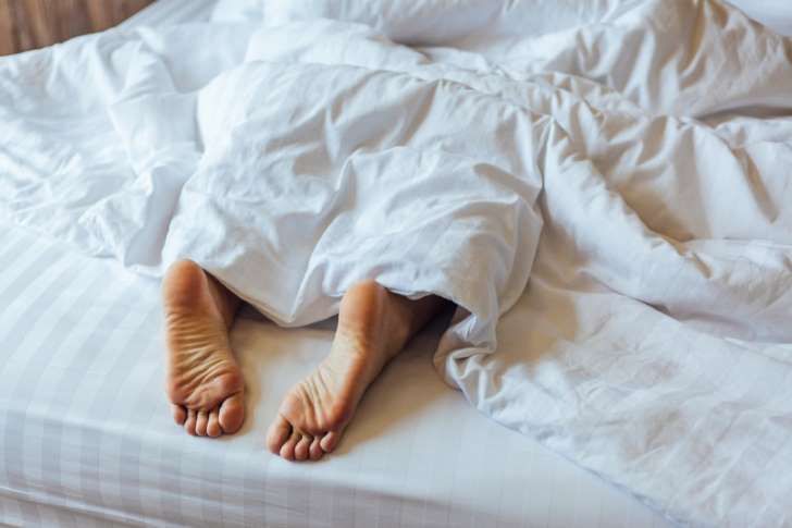 This is why you should sleep with your feet outside the covers